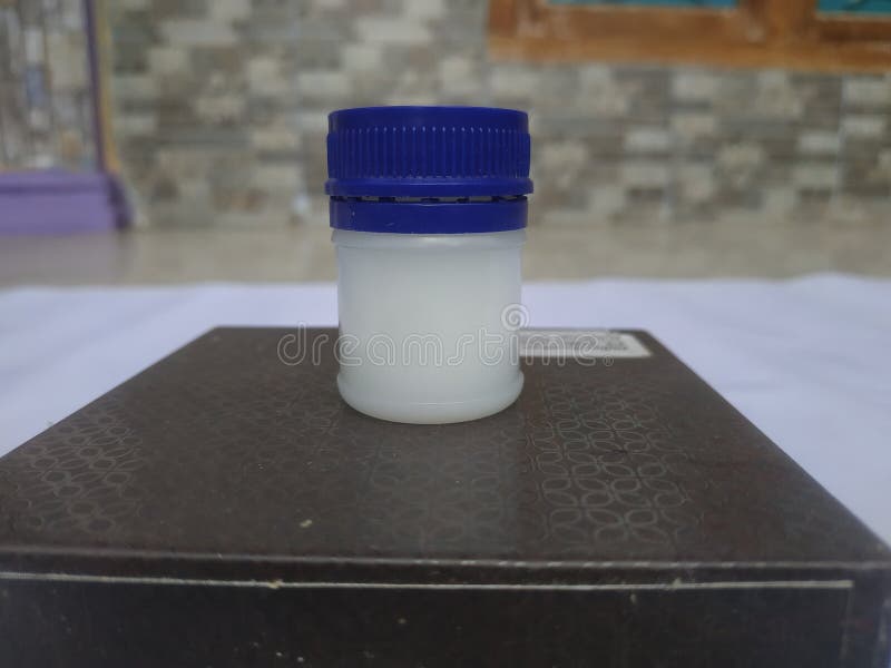 Small ointment bottle stock image. Image of clothing - 269711645