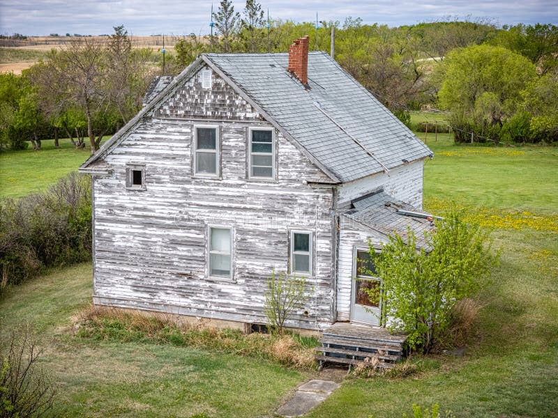 Small, Old House with a White Exterior and a Chimney Stock Photo ...
