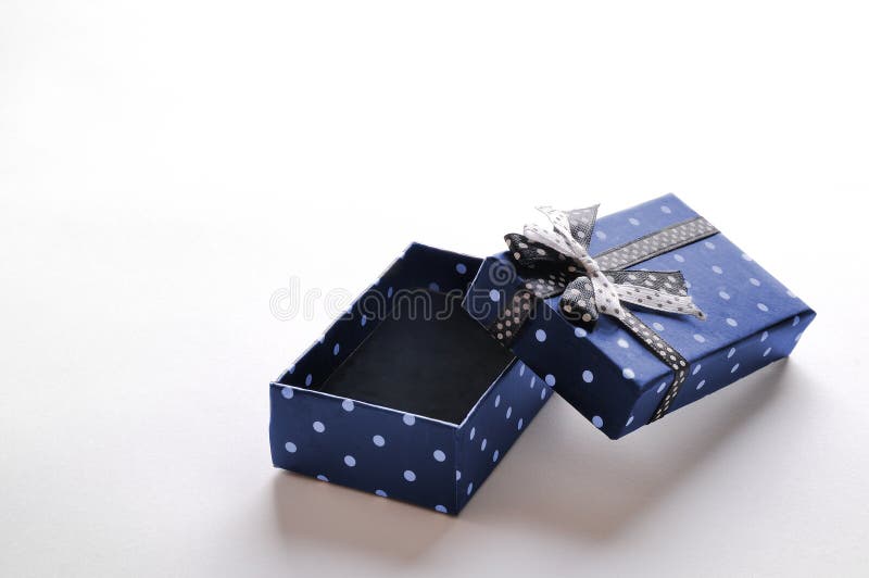 Small Open Blue Gift Box with Ribbon and Circles Stock Photo - Image of ...