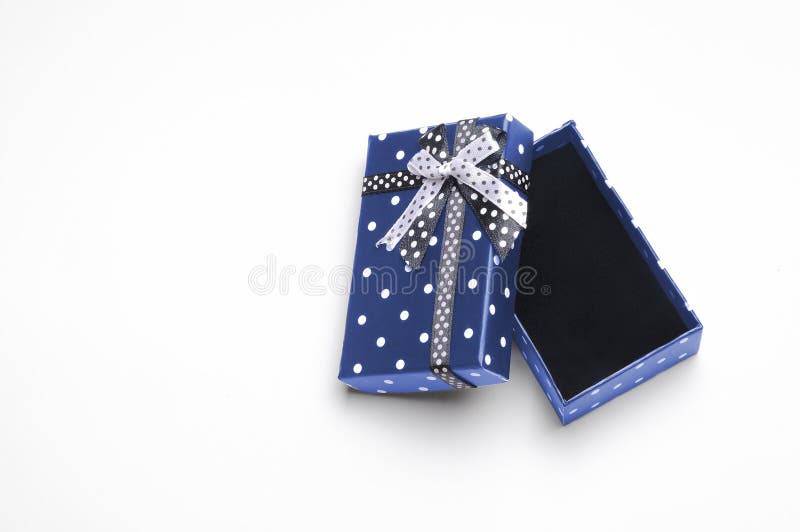 Small Open Blue Gift Box with Ribbon and Circles Top Stock Photo ...
