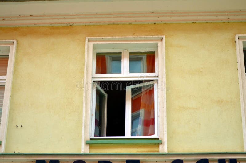 Small Open Window with Yellow Facade Stock Image - Image of ...