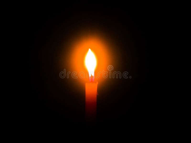 A Small Orange Candle Light in the Darkness of the Night 2 Stock Image ...
