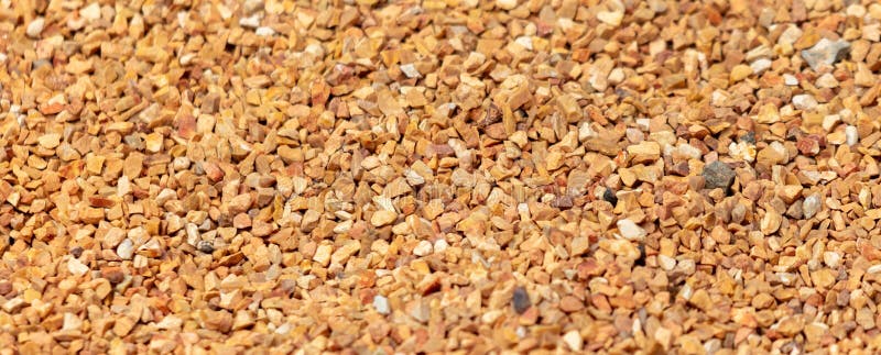 Small Orange Crushed Stone. As a Background Stock Image - Image of ...