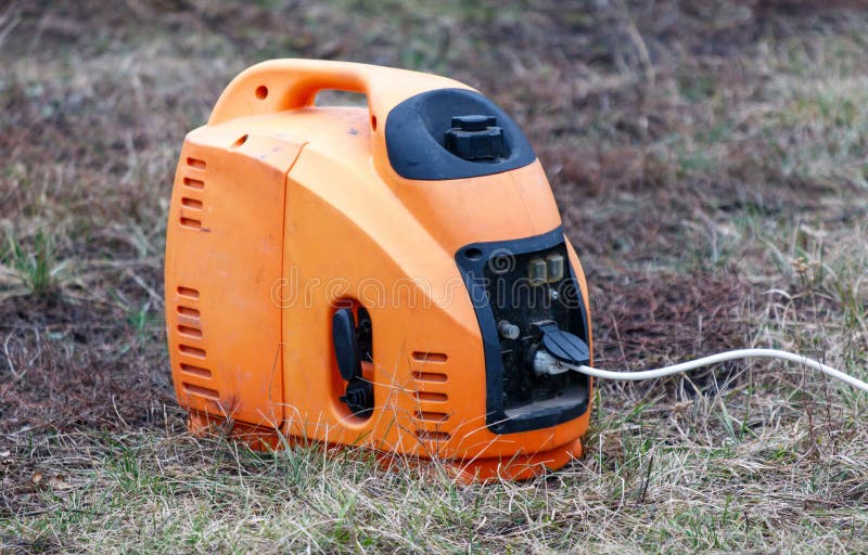 Small Orange Generator Sits Grass Stock Photos - Free & Royalty-Free ...