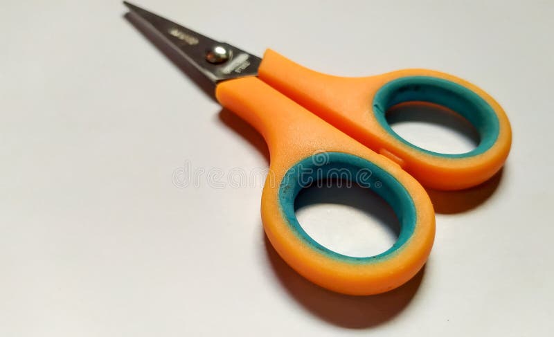 Small Orange Hair Scissors that are Very Multifunctional Stock Image ...