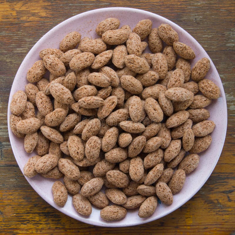 Small Oval Cookies on a Pink Plate - View from Above Stock Photo ...