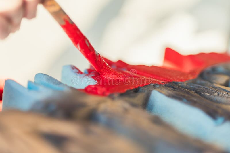 Paintbrush Painting the Surface of Some Polystyrene Surface Stock Image ...