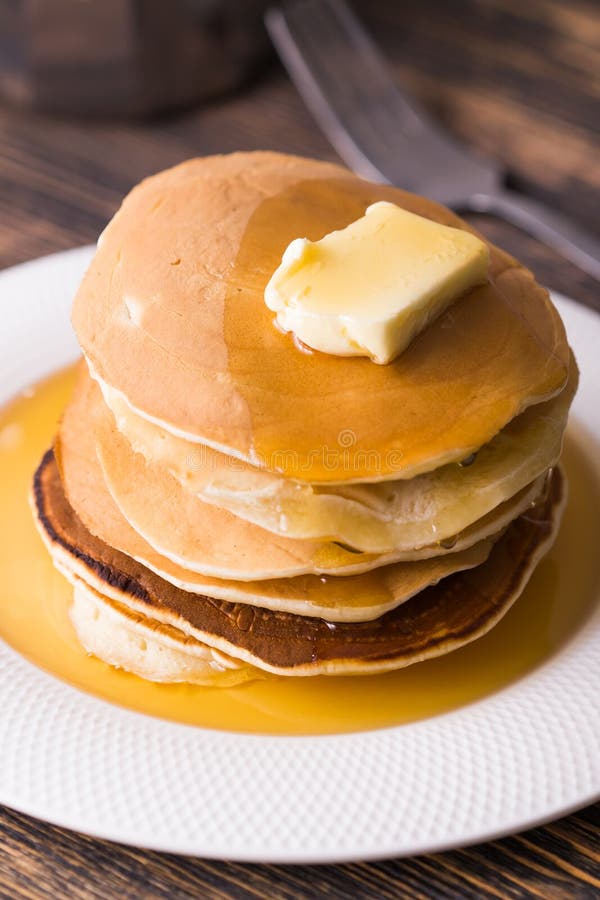 Small Pancakes with Maple Syrup and Butter on Wooden Table. Breakfast ...