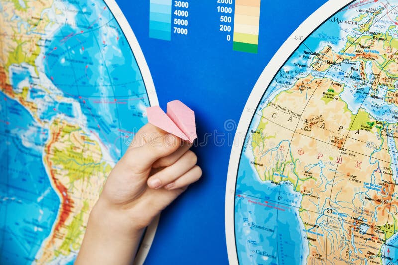 Small Paper Airplane on Intercontinental Flight To World Map Stock ...