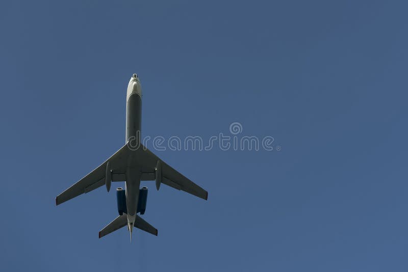 Small Passenger Aircraft with Engines in the Tail Unit Against the Blue ...