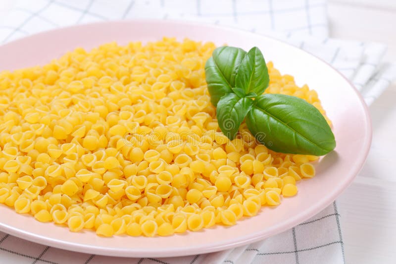 Dry Small Pasta in the Form of Short Dough Tubes Stock Image - Image of ...