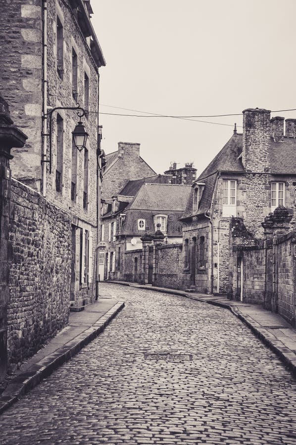 Small Paved Alley in Dinan stock photo. Image of pavement - 129014152