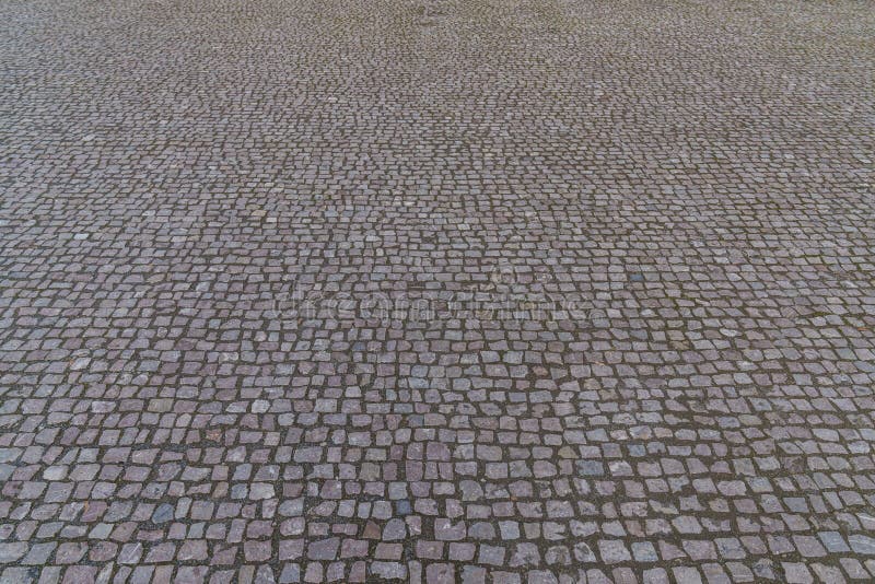 Small Paving Stones Laid on a Large Square Stock Photo - Image of city ...