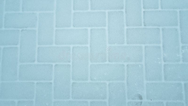 Small Paving Tiles of a Pavement Covered by Snow Stock Image - Image of ...