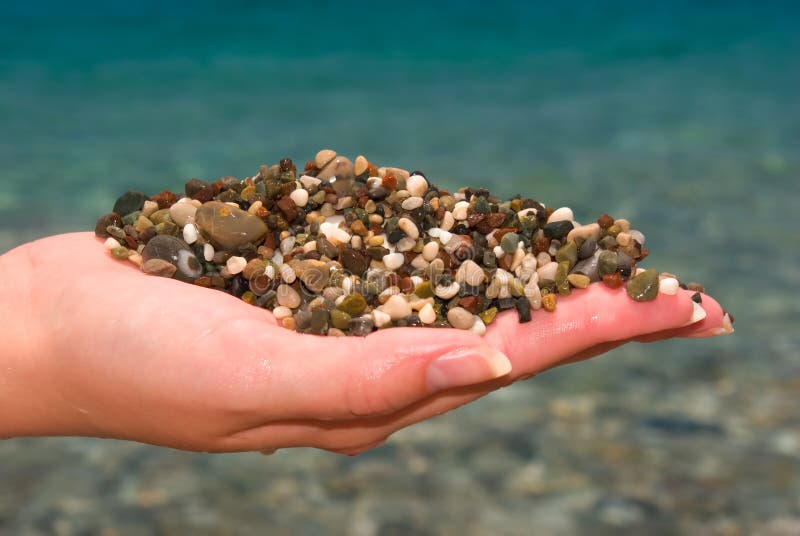 Small pebble stock image. Image of pebble, sunlight, holding - 11986845