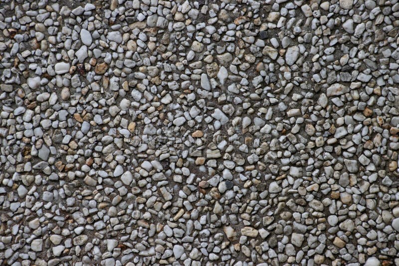 Small Pebbles in Concrete Wall for Background Stock Image - Image of ...