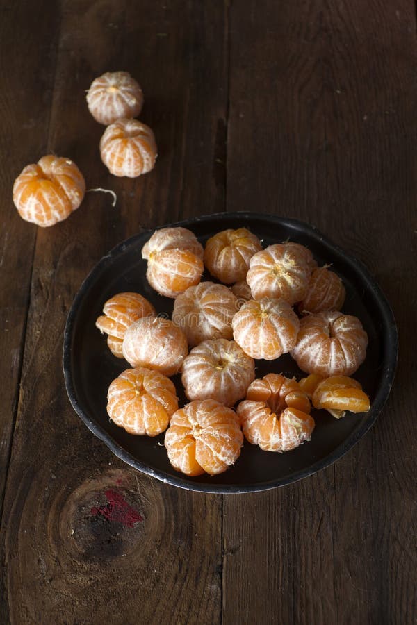 Small peeled mandarin stock photo. Image of organic, tangerine - 84427720