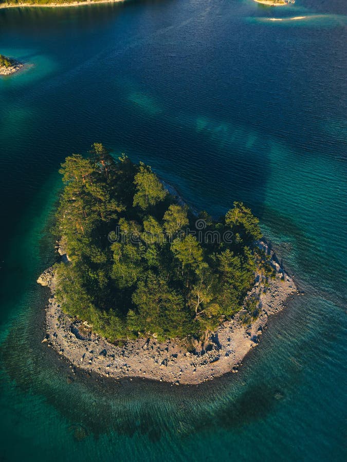Small Peninsula with Fir Forest Trees in the Middle of the Lake Stock ...