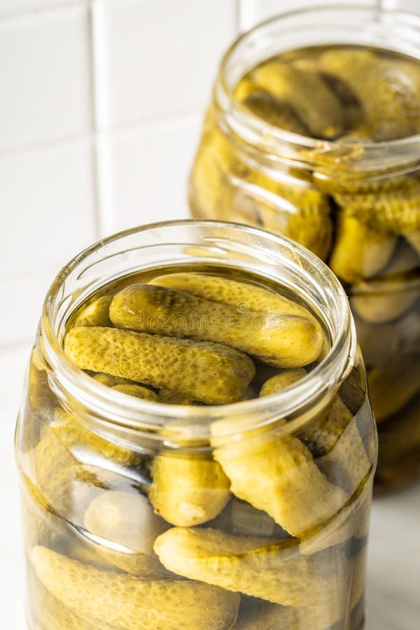 Small Pickles. Marinated Pickled Cucumbers in Jar Stock Image - Image ...