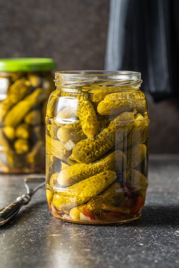 Small Pickles. Marinated Pickled Cucumbers in Jar Stock Photo - Image ...