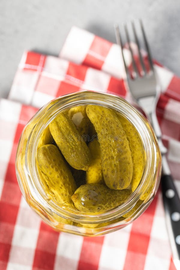 Small Pickles. Marinated Pickled Cucumbers in Jar Stock Photo - Image ...