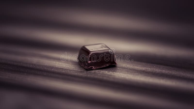 A Small Piece of Chocolate Sitting on a Table Top, AI Stock Photo ...