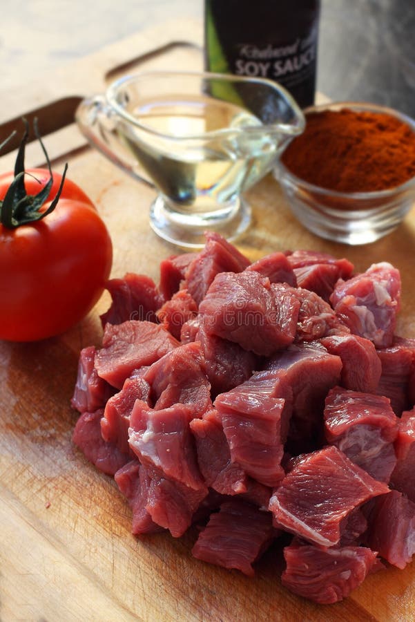 Small Pieces of Casseroled Meat with Tomatoes Stock Photo - Image of ...