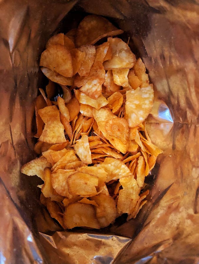 Small Pieces of Potato Chips in Packages Stock Image - Image of flying ...