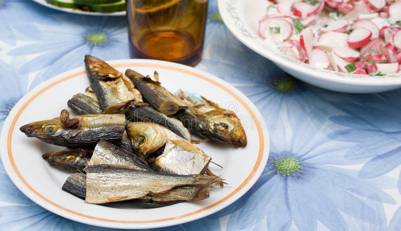 The Small Pieces of Smoked Fish on a Platter Stock Photo - Image of ...
