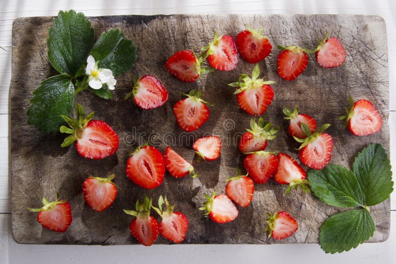 Small Pieces of Strawberries Stock Photo - Image of leaf, organic: 41681048