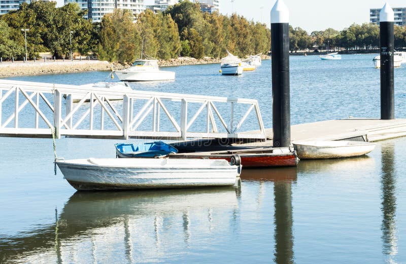 Small Pier with Boats in the Cook River, Sydney, Australia. Stock Photo ...