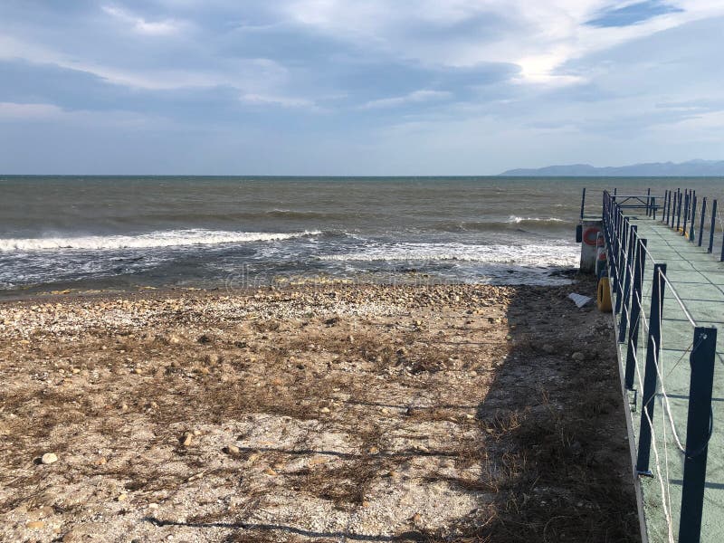 A Small Pier Structure by the Sea Stock Photo - Image of pier, cloud ...