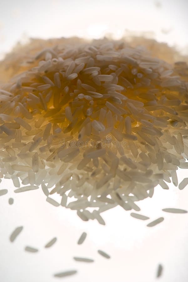 Small Pile of Illuminated Long White Rice Stock Image - Image of grain ...
