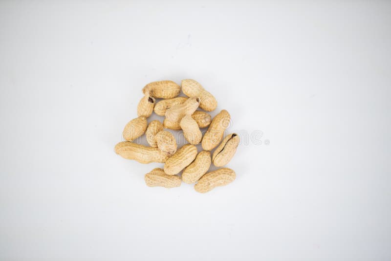 Small Pile of Peanuts in Shell Isolated on White Table Stock Image ...