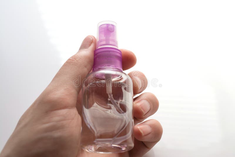 Small Pink Plastic Bottle with an Antiseptic in Hands Stock Image ...