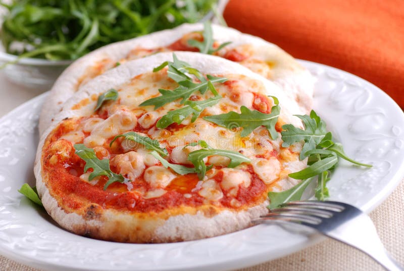 Small pizza on the plate stock image. Image of delicious - 29604733