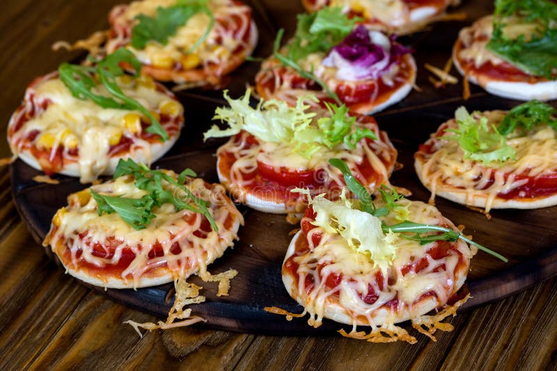 Small pizzas stock image. Image of drink, baked, pizza - 25937631