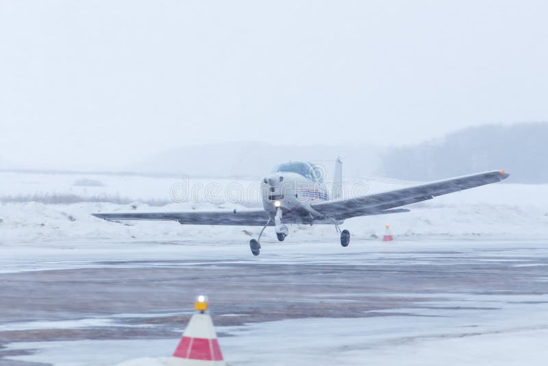 Small Plane at the Airport in Winter Stock Photo - Image of seaplane ...