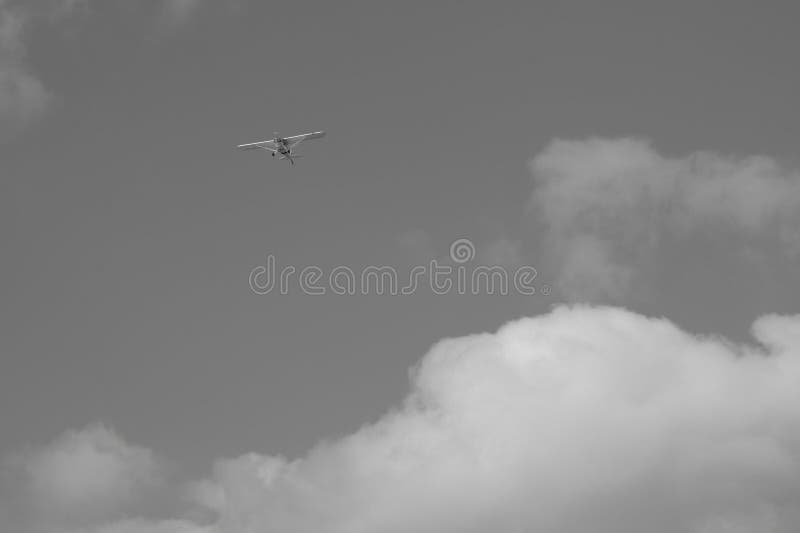Small Plane Doing Pirouettes in the Cloudy Sky Stock Image - Image of ...