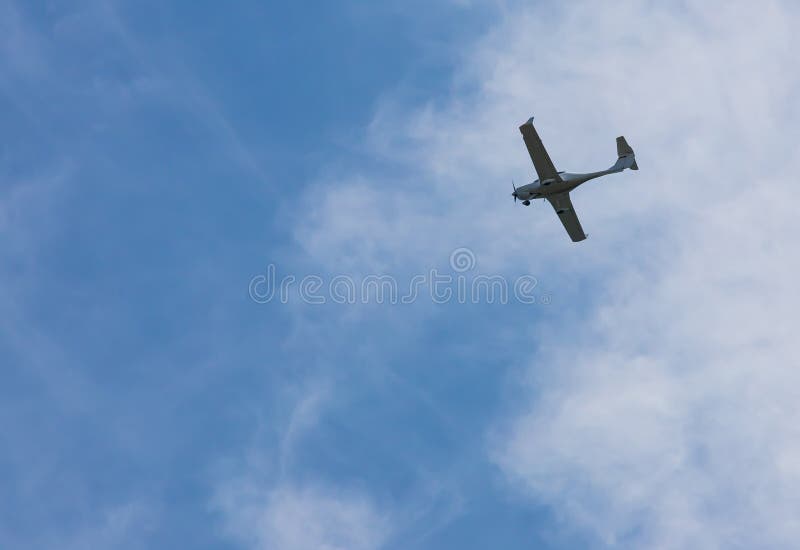 Small Plane Flying Low in the Sky with Space for Text Stock Photo ...