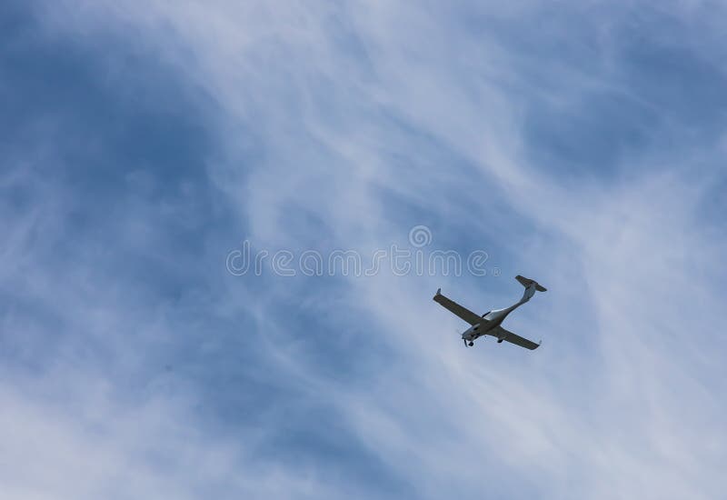 Small Plane Flying Low in the Sky with Space for Text Stock Image ...