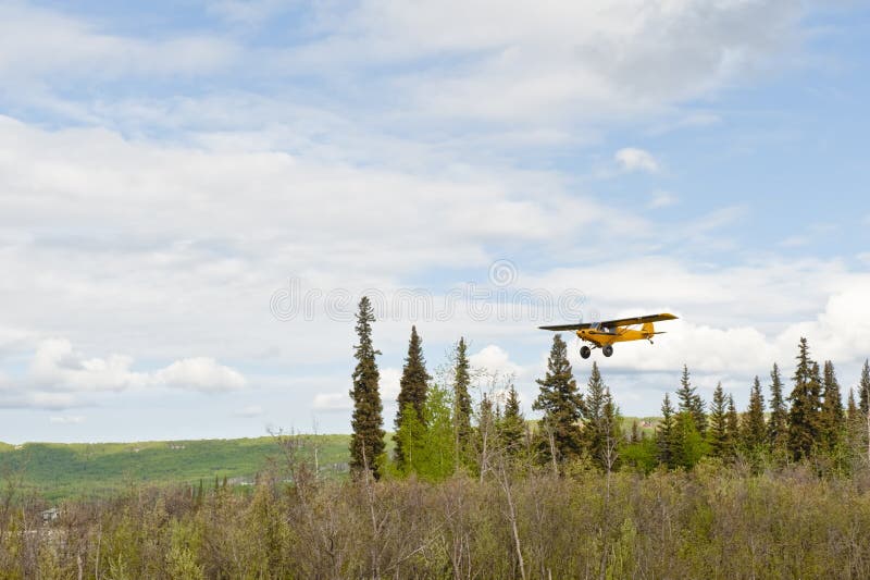 Small Plane Flying Over Alaska Stock Image - Image of greenery, flying ...