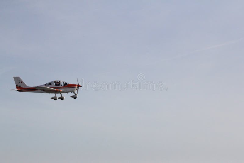 A Small Plane Flying in the Sky, with a Remote Control Inside Stock ...
