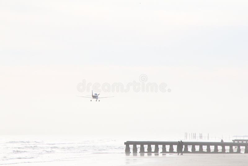 A Small Plane Flying in the Sky, with a Remote Control Inside, Very Low ...