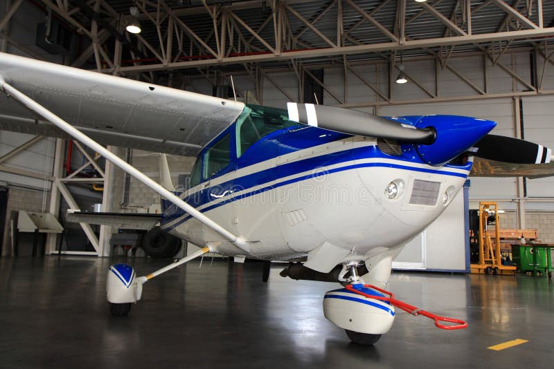 Small plane in hangar stock photo. Image of hobby, hangar - 33927948