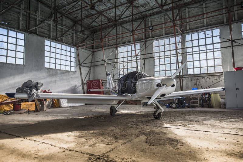 Small Plane Inside Hangar in Daylight Stock Image - Image of inside ...