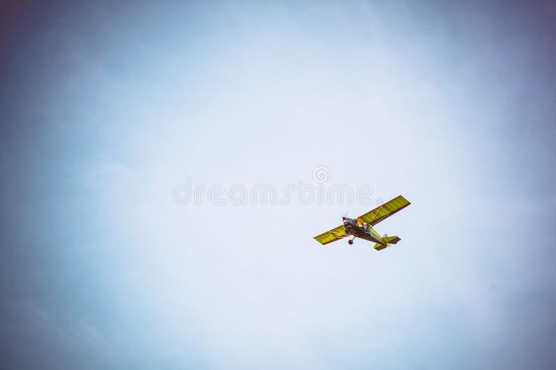 Small Plane in the Sky and on the Field Stock Photo - Image of aerial ...