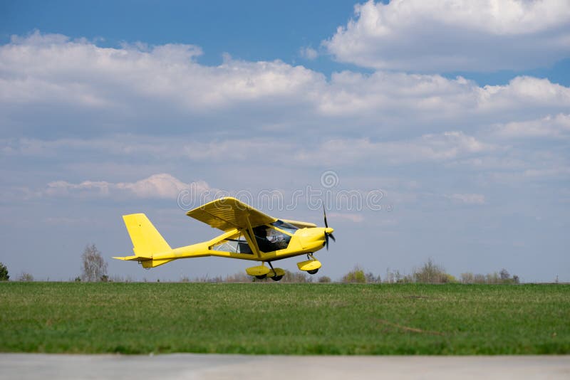 Small Plane Taking Off from Green Field. Concept of Increase and ...