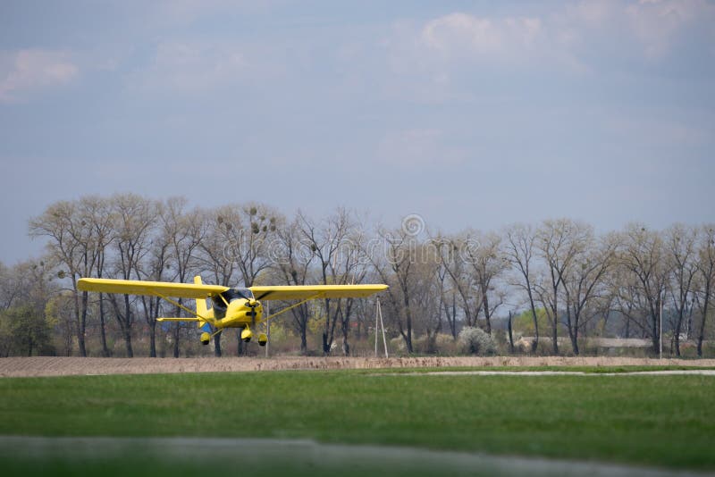 Small Plane Taking Off from Green Field. Concept of Increase and ...