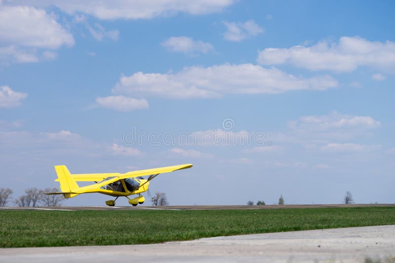 Small Plane Taking Off from Green Field. Concept of Increase and ...